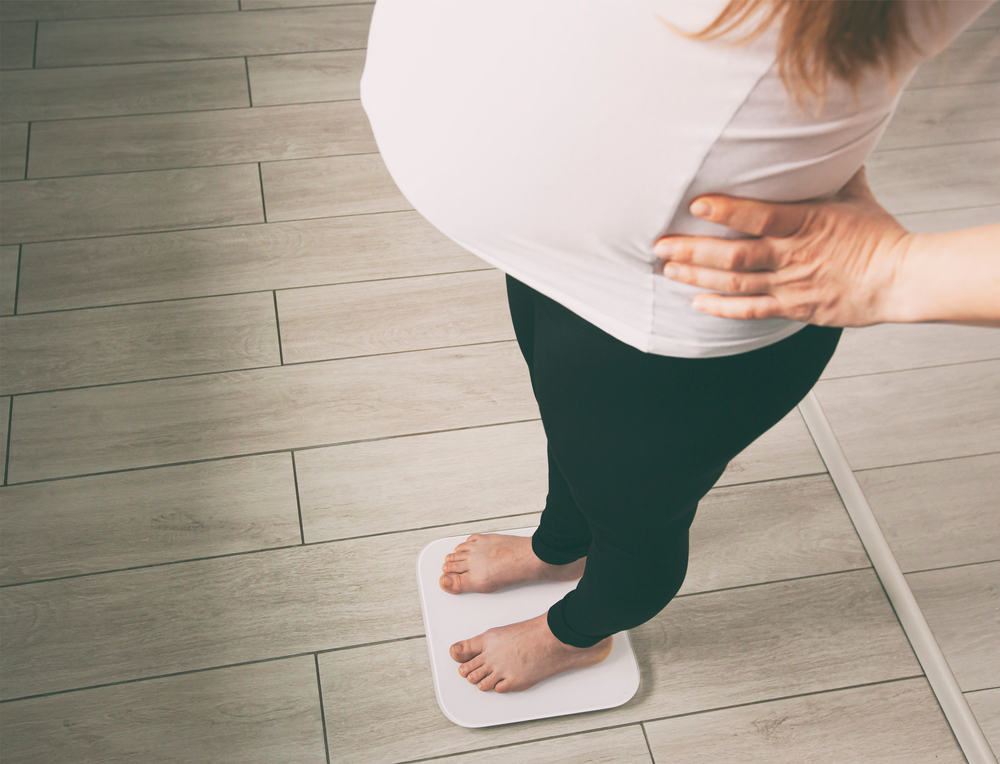 A,Pregnant,Woman,Is,Weighed,On,A,Bathroom,Scale - Birmingham Obstetrics ...